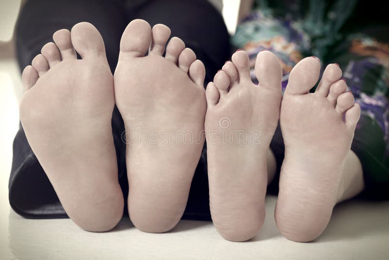 Couple feet stock image. Image of lying, female, rest - 96314511