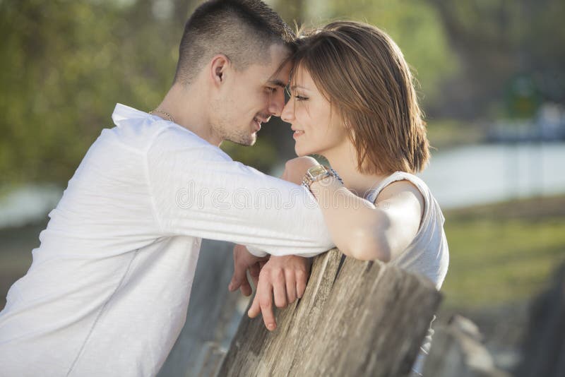Couple on the Fence stock image. Image of family, date - 122913