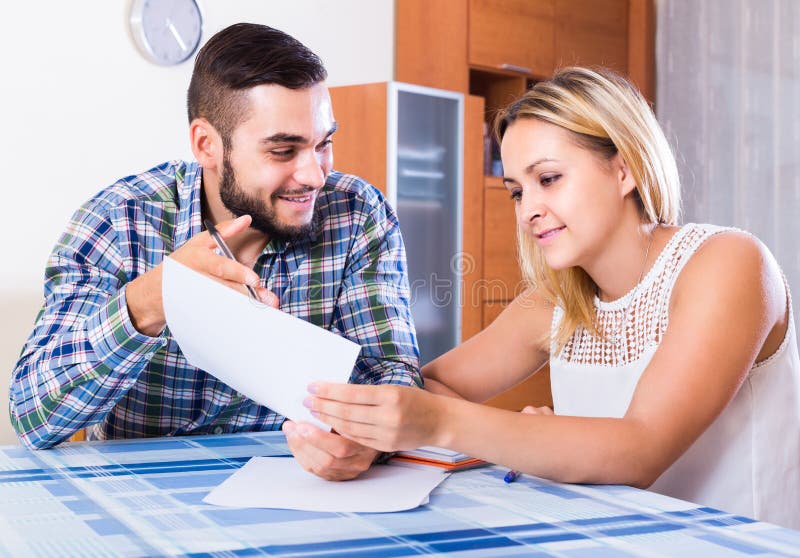 Filling out tax forms stock image. Image of hand, bill - 13426793