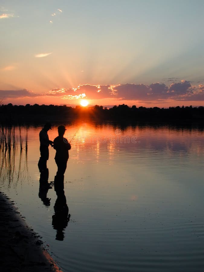 Couple fishing stock photo. Image of shadow, catch, figure - 575972