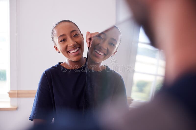 Couple Fitting Flat Screen TV Onto Wall at Home Together Stock Photo ...