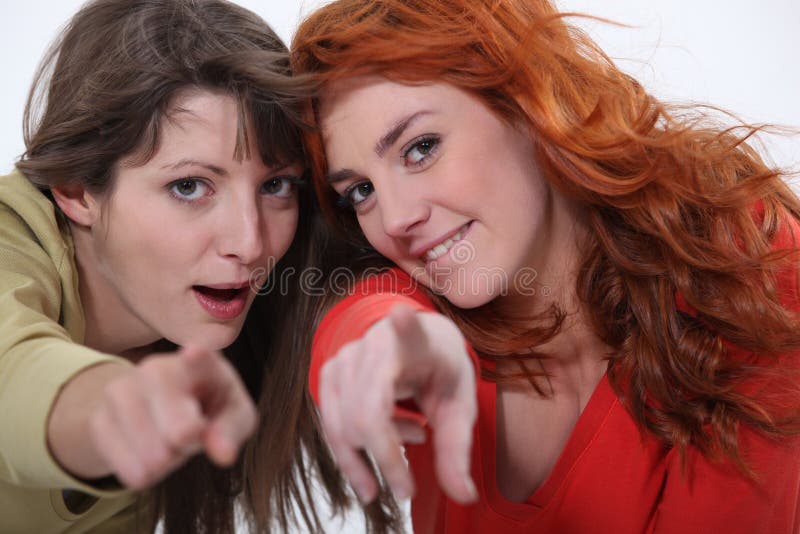 Couple of friends pointing stock photo. Image of garden - 26959900