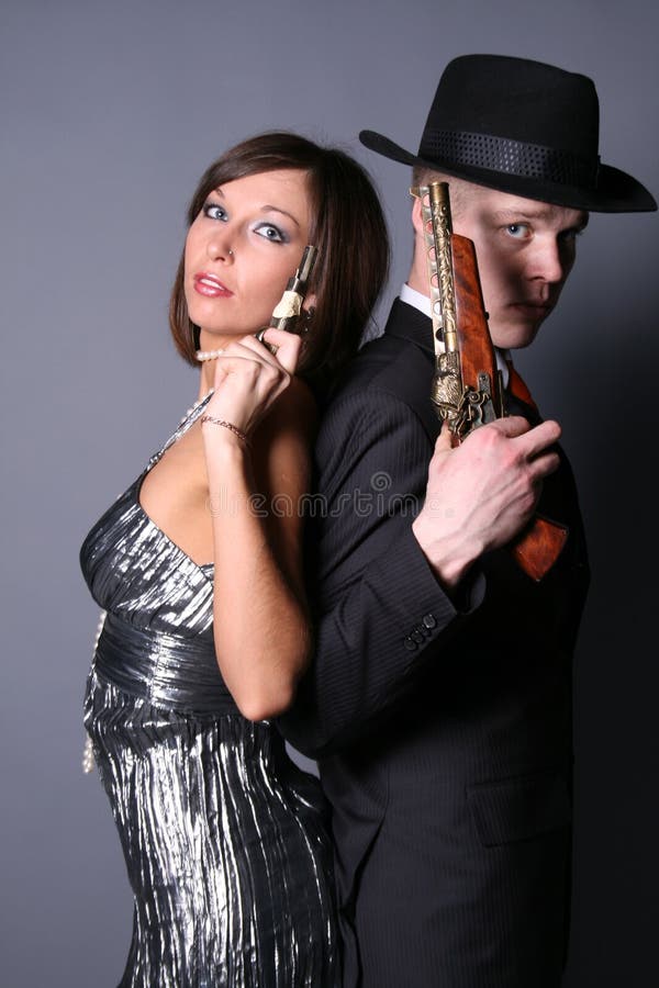 Couple of gangsters stock photo. Image of expression, bracelets - 8490136