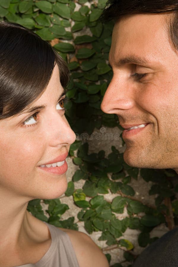 Couple Gazing At Each Other On Park Bench Stock Image - Image of smile ...