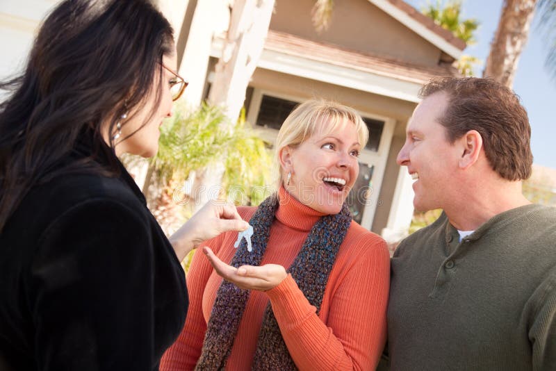 Couple Get House Keys from Hispanic Agent Stock Image - Image of ...