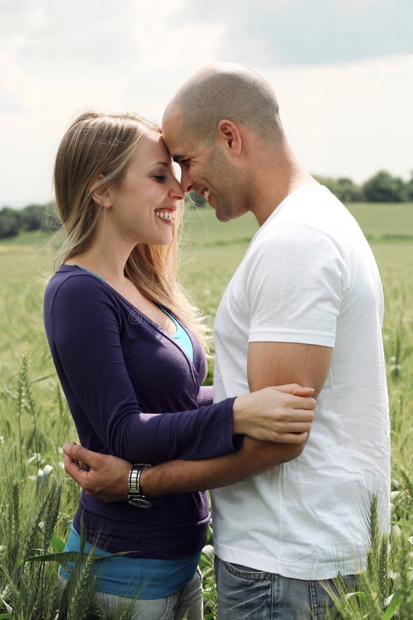 Attractive Couple in Love stock image. Image of embrace - 15519297