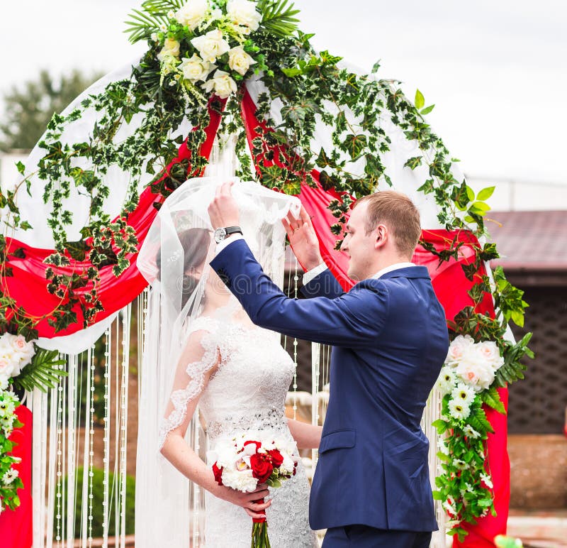 Couple Getting Married at an Outdoor Wedding Ceremony Stock Image ...