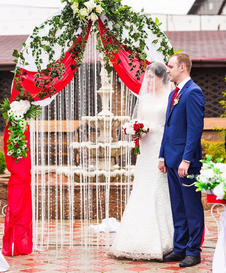 Couple Getting Married at an Outdoor Wedding Ceremony Stock Photo ...