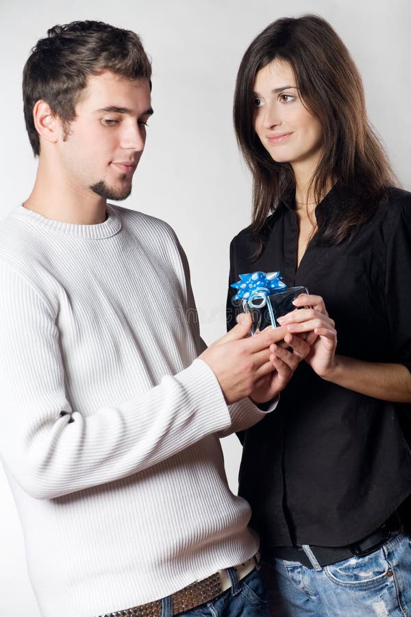 Couple with gift box stock image. Image of happiness, vertical - 1657883