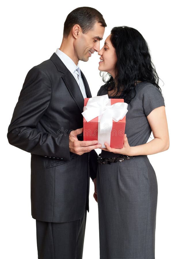 Couple with Gift Box, Studio Portrait on White. Dressed in Black Suit ...