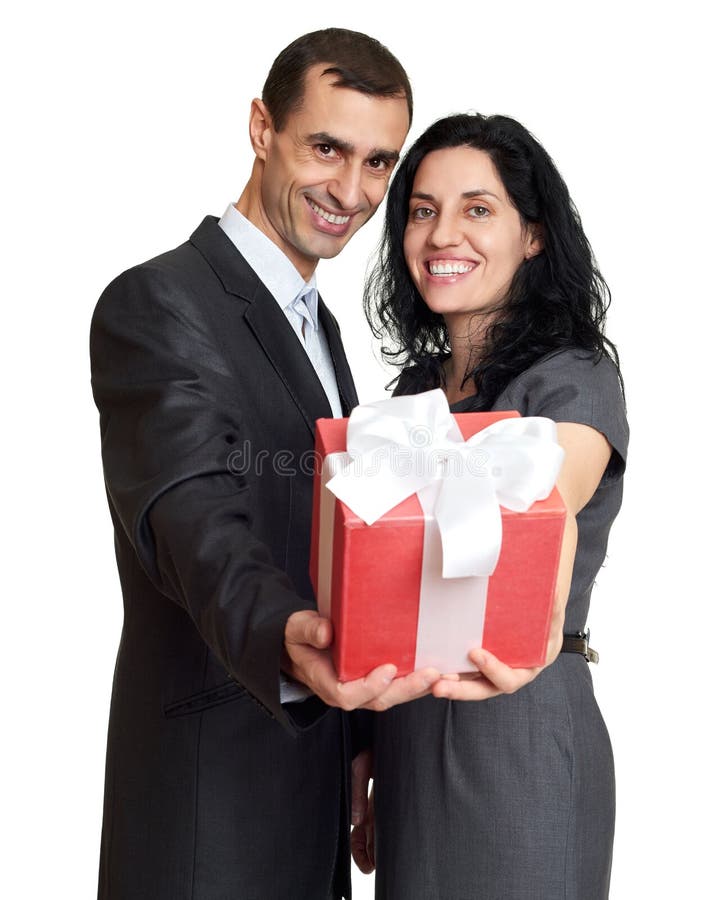 Couple with Gift Box, Studio Portrait on White. Dressed in Black Suit ...