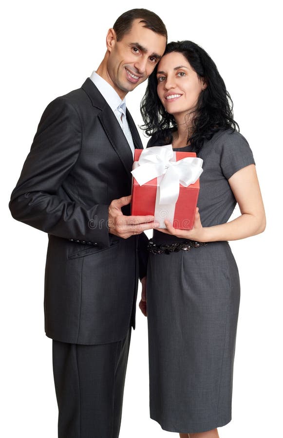 Couple with Gift Box, Studio Portrait on White. Dressed in Black Suit ...