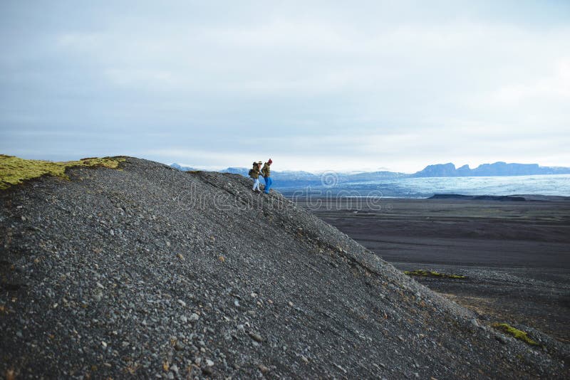 Couple Going Down Hill stock photo. Image of color, activity - 84348524