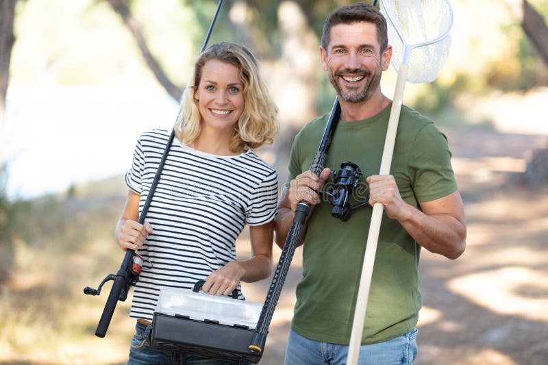 Couple Going Fishing with Fish Rod and Net Stock Photo - Image of hobby ...