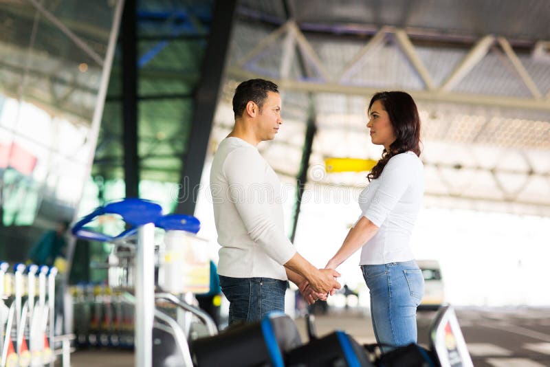 Couple good bye airport stock photo. Image of hand, boyfriend - 43156434
