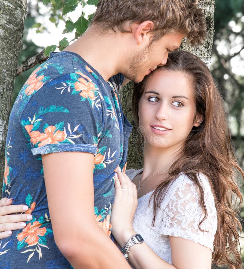 Couple has fun in the park stock image. Image of beautiful - 100904227