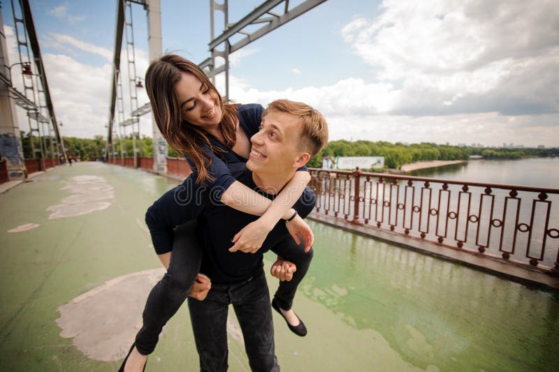 Couple Have Fun on the Bridge Stock Photo - Image of gift, lifestyles ...