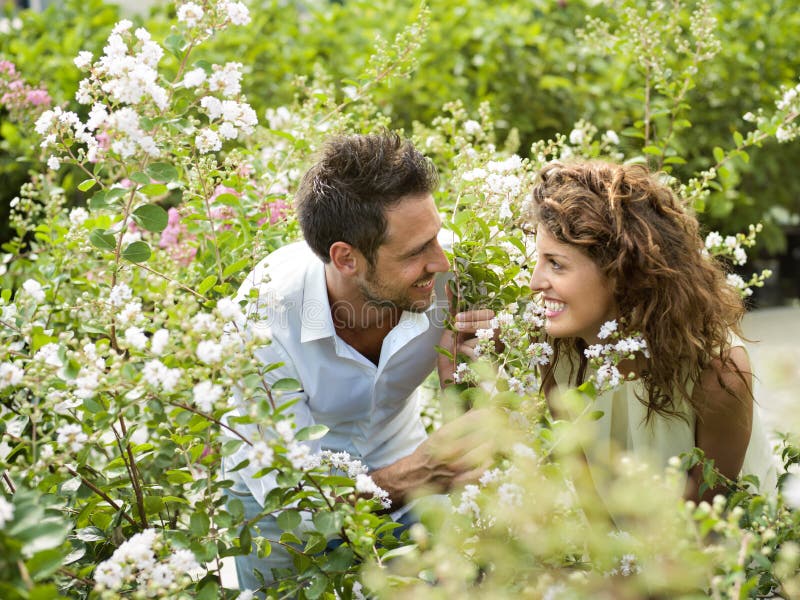Couple Have Fun Choosing Flower Stock Photo - Image of spring, family ...