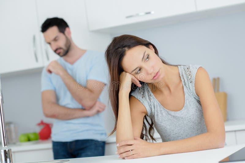 Couple Having Argument in Kitchen Stock Image - Image of camera ...