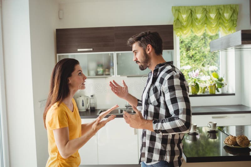 Couple Having Argument in Kitchen Stock Photo - Image of communication ...