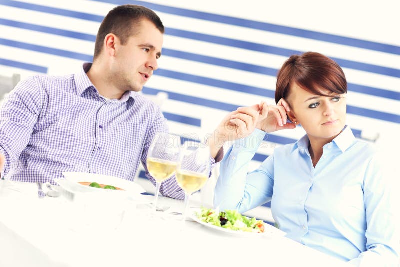 Couple Having Argument in a Restaurant Stock Image - Image of ...
