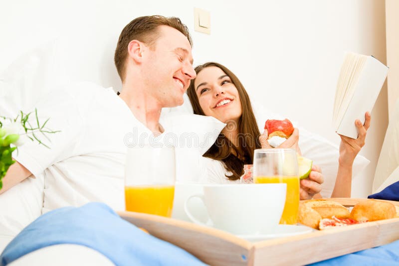 Couple Having Breakfast in Bed Stock Image - Image of couple ...