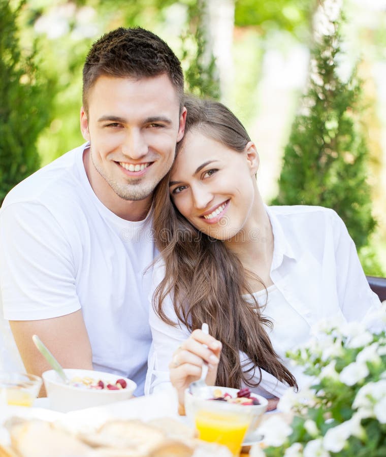 Couple Having Breakfast stock photo. Image of eyes, breakfast - 30903172