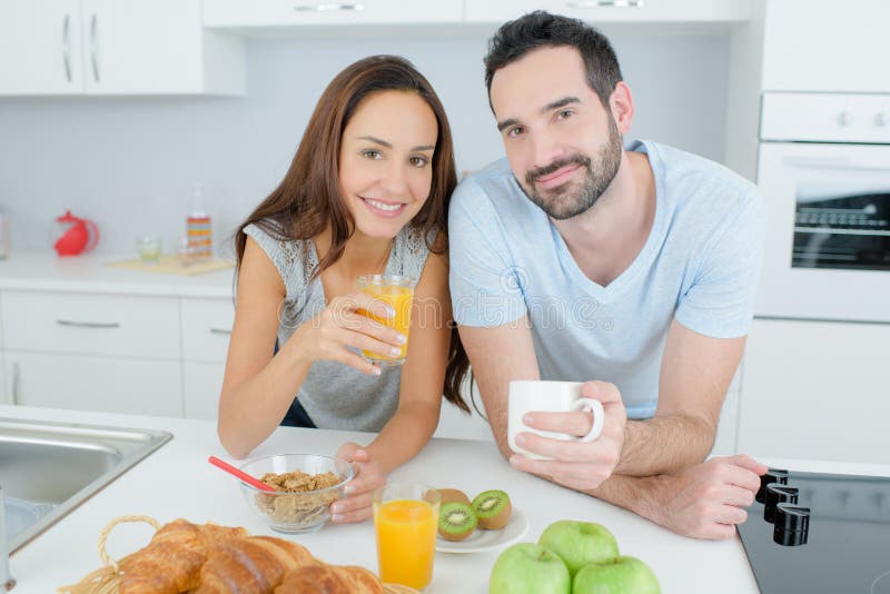 Couple Having Breakfast Together Stock Photo - Image of house ...