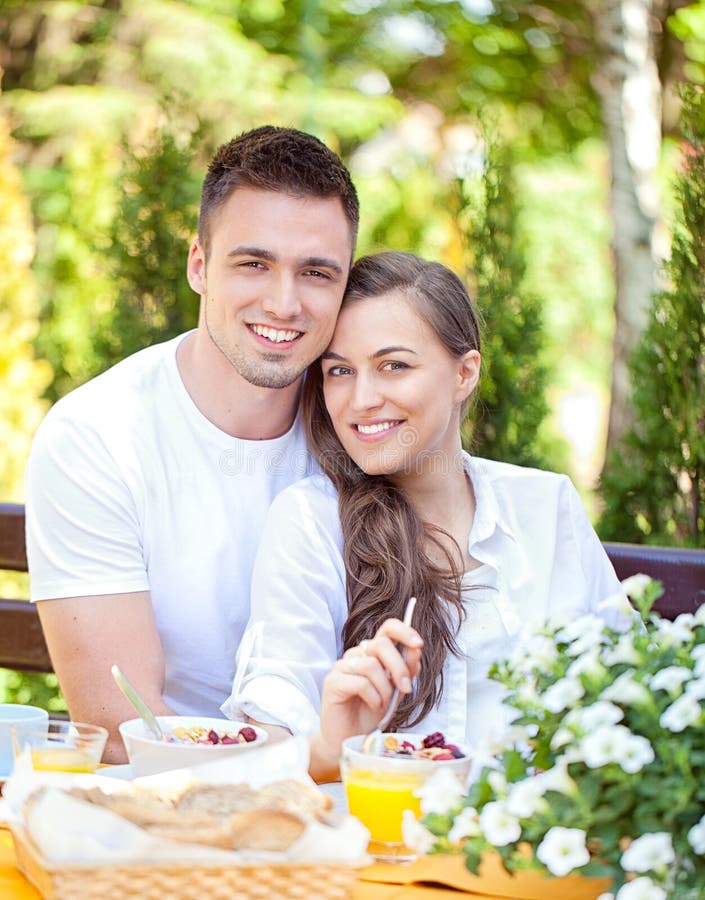 Couple Having Breakfast stock image. Image of outdoors - 30903203