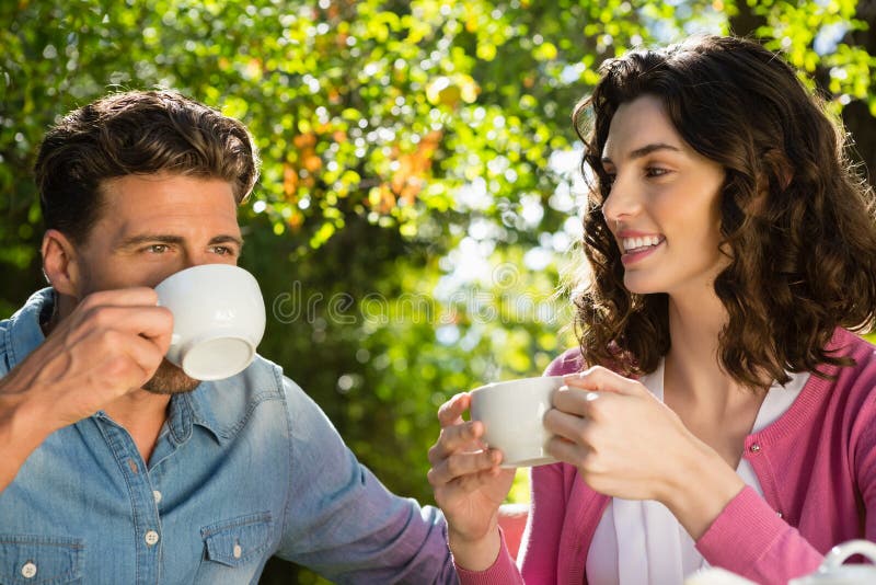 Couple Having Cup of Tea in Garden Stock Image - Image of lifestyle ...