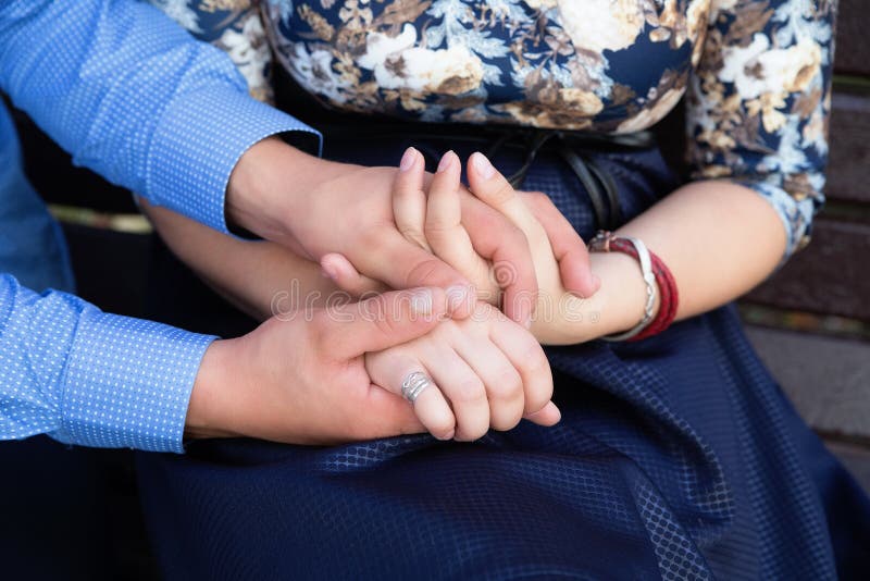 Couple Having a Date, Holding Each Others Hands Stock Photo - Image of ...