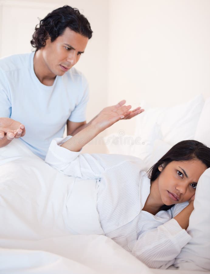 Couple Having a Dispute in the Bedroom Stock Photo - Image of bedroom ...