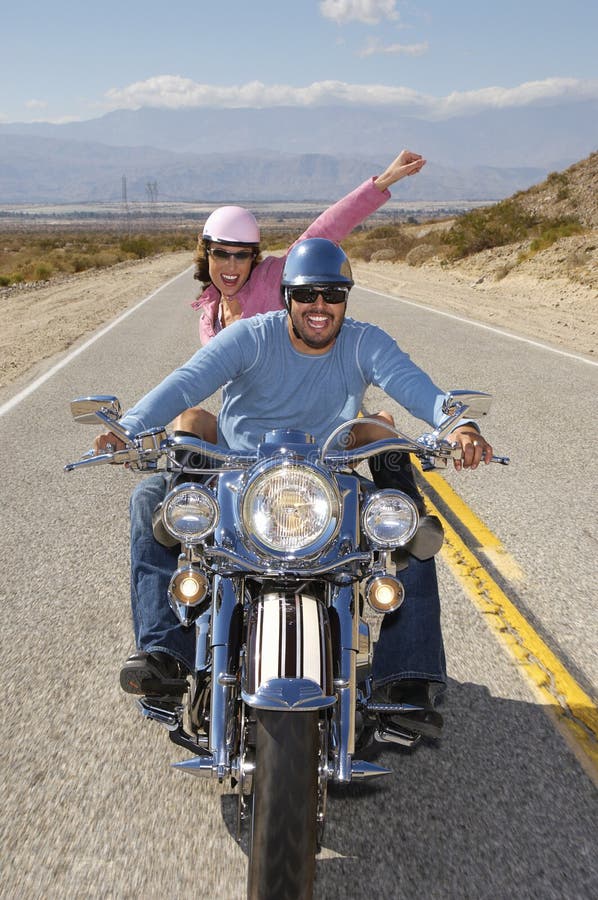 Couple Having Fun on a Bike Ride Stock Image - Image of hispanic ...