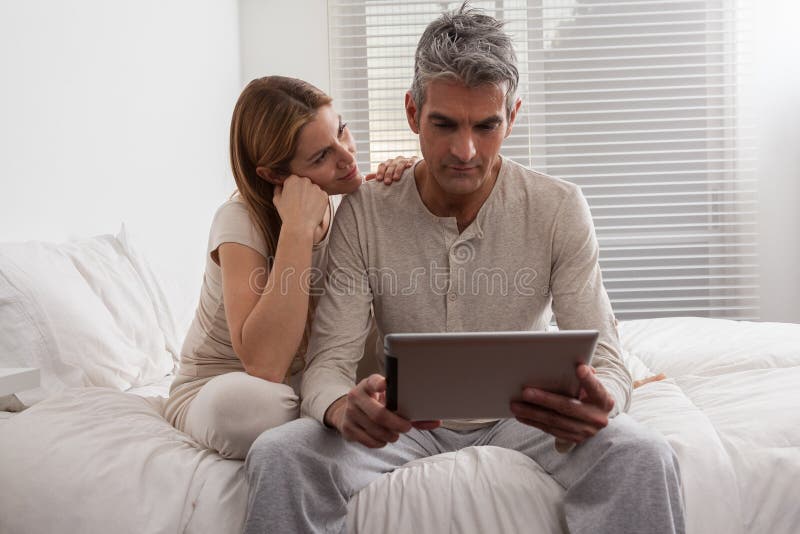 Couple Having Fun with the Ipad Stock Image - Image of marriage ...