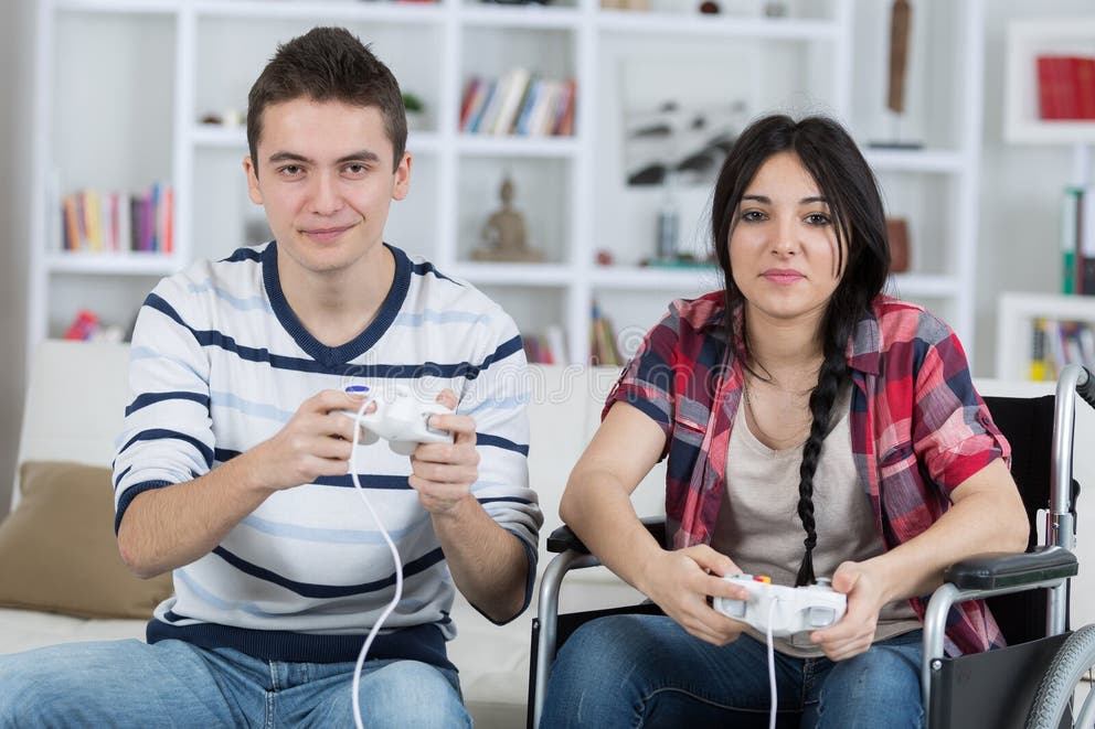 Couple Having Fun Playing Videogames at Home Stock Photo - Image of family, controller: 269813106
