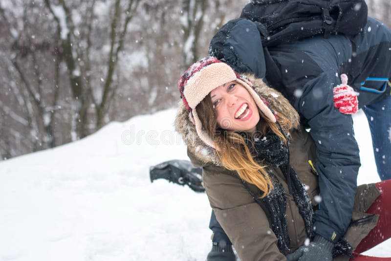 Couple Having Fun in Snow Covered Park Stock Photo - Image of forest ...