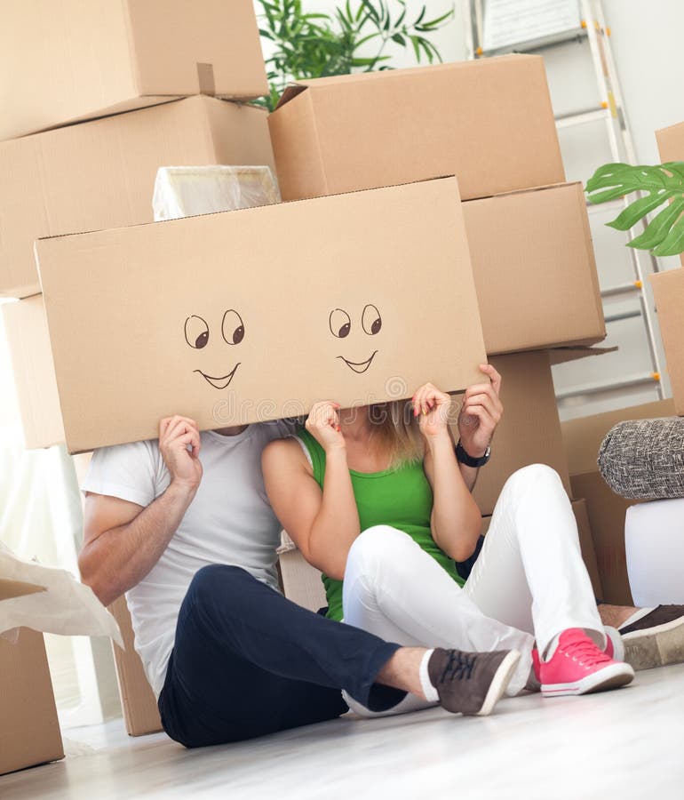 Couple Having Fun in Their New House Stock Photo - Image of female ...