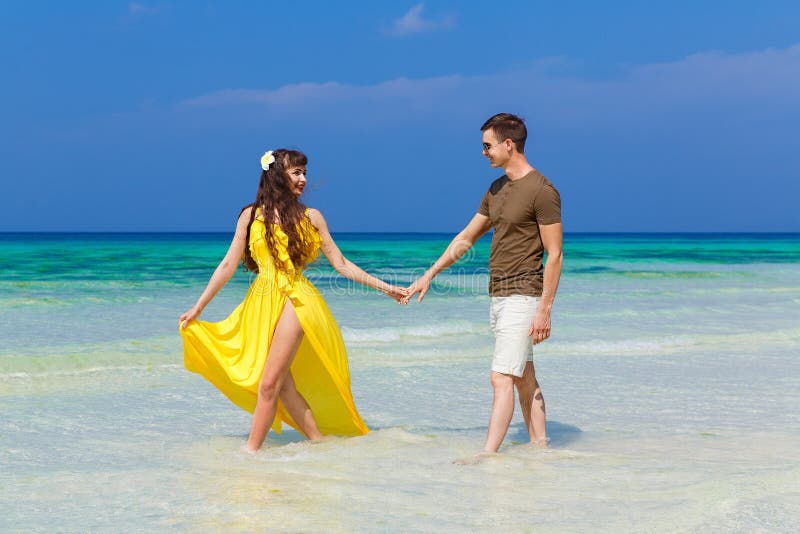 Couple Having Fun on Tropical Beach. Summer Vacation Concept. Stock ...