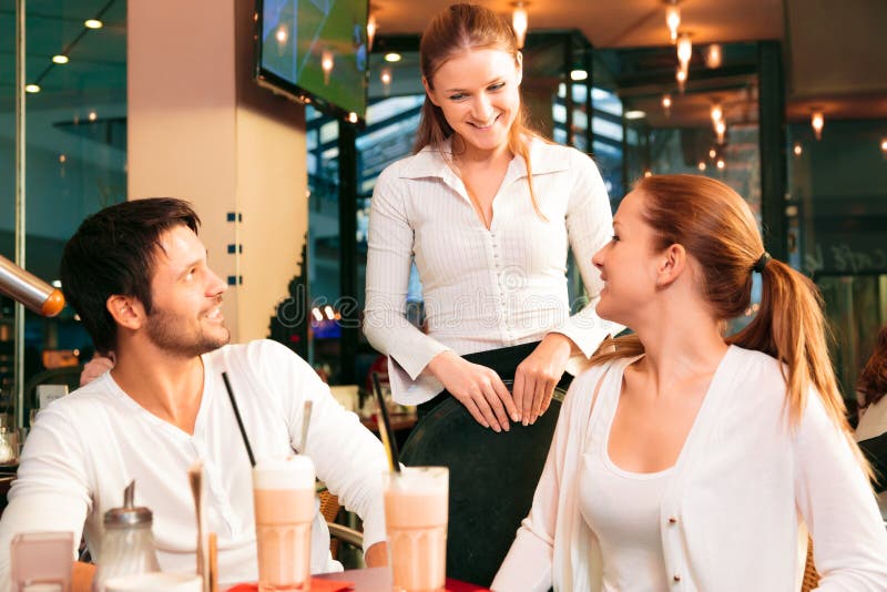 Couple Having a Good Time in Cafe Stock Image - Image of male, drink ...