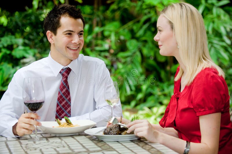 Couple Having Meal stock photo. Image of couple, conversation - 14361718