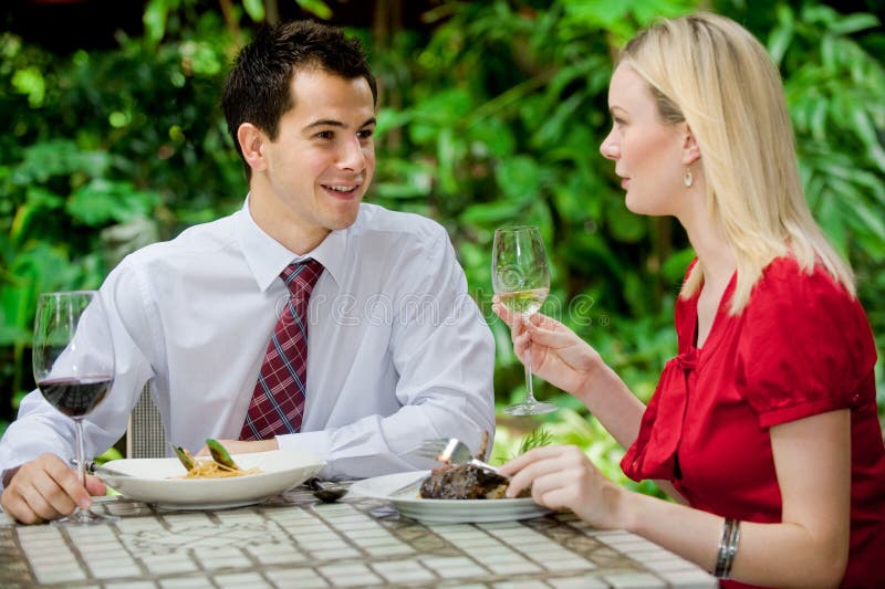 Couple Having Meal stock photo. Image of chatting, male - 14750440