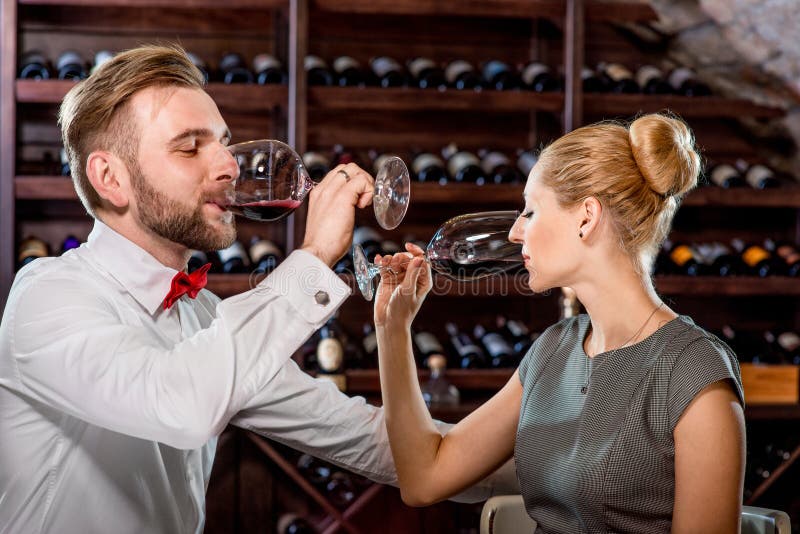 Couple Having Romantic Wine Tasting at the Cellar Stock Image - Image ...