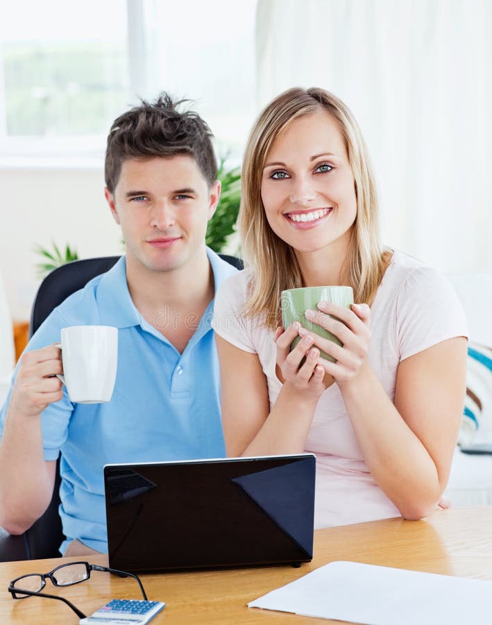 Couple having tea break stock photo. Image of drinking - 16347486