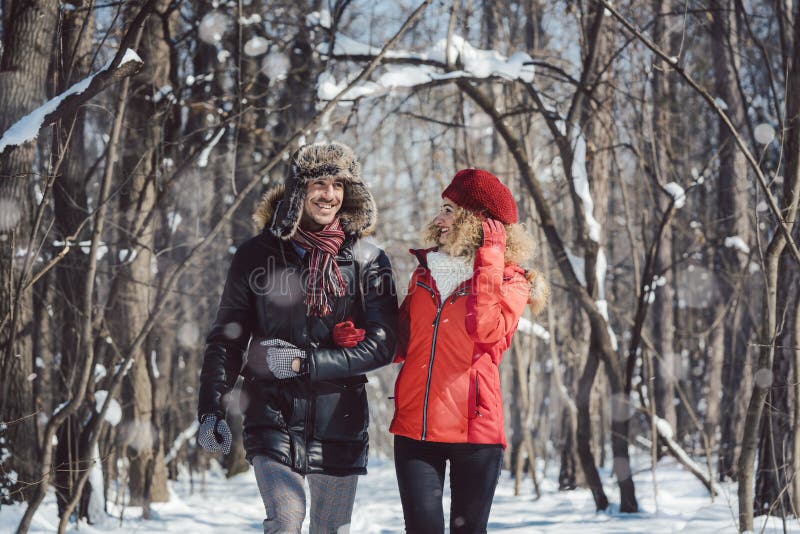 Couple Having a Winter Walk on a Chilly Cold Day in the Woods Stock ...