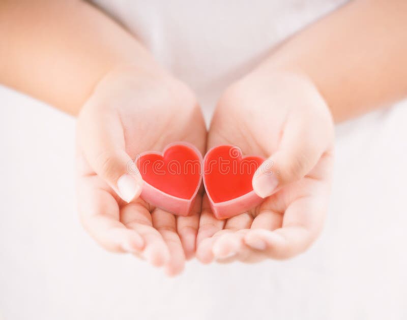 Couple heart on hand stock image. Image of hand, support - 208292293
