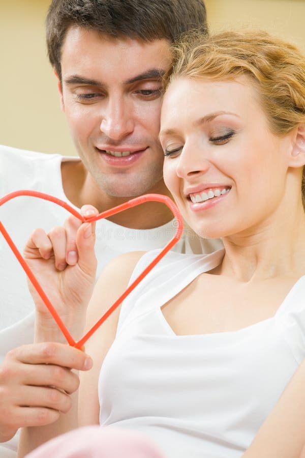 Couple with heart symbol stock photo. Image of home, date - 7802682