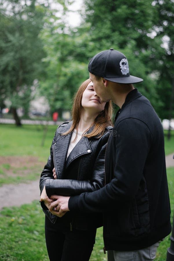 Couple higging in the park stock image. Image of couple - 93605441