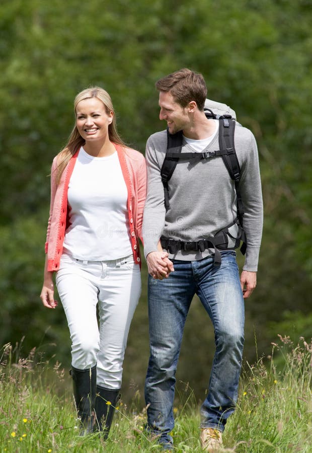 Senior Couple Walking Along Autumn Path Stock Image - Image of loving ... Senior Couple Walking Along Autumn Path Stock Image - Image of loving ...