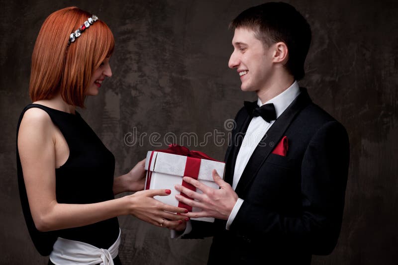 Couple Holding Gift Box Together Stock Photo - Image of girl, holiday ...