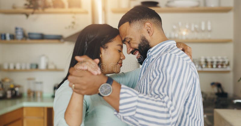 Couple, Holding Hands and Dancing in Kitchen, Touch and Love on Valentines Day. Happy People ...